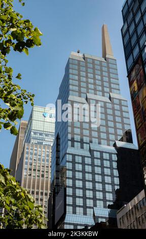 The offset glass pinnacle atop 750 Seventh Avenue is a familiar sight ...