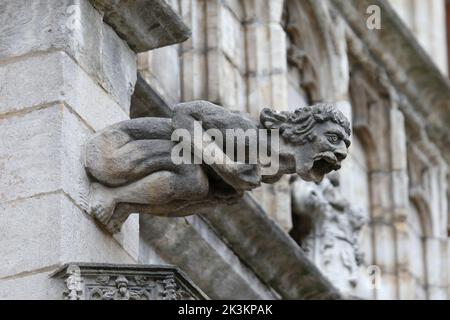 Monstrous statue with almost human features called gargoyle on the ...