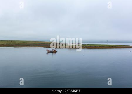Fishing boat and the Holms of Stromness, from the NorthLink Ferries ...