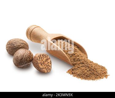 Spice nutmeg powder in scoop on white background Stock Photo - Alamy