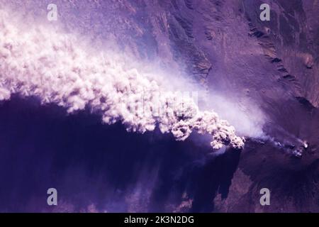 A volcano from outer space. Elements of this image furnished by NASA ...