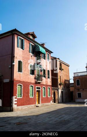A red house in the Murano Island, Venice Stock Photo - Alamy