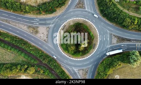 Aerial shot of a ring road surrounded by a field in the daylight Stock ...