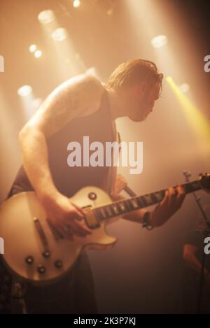 Super sick solo. A guitarist performing a sick solo while rocking out ...