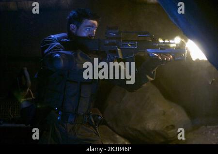 KARL URBAN in DOOM (2005), directed by ANDRZEJ BARTKOWIAK. Credit ...