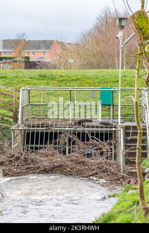 Blockage management in public UK park, preventing debris from ...