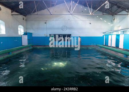 A swimmer enyojing at the Sulfur pool at the Soviet-era Abastumani ...