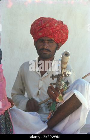 Rajasthani Folk Singer Playing Sarangi, Suraj Kund Fair, Rajasthan ...