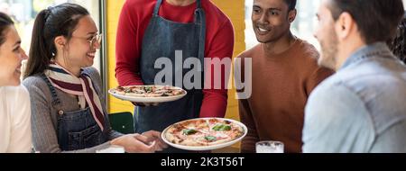 Horizontal banner or header with waiter serving delicious pizzas ...