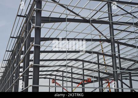 New steel framed building under construction Stock Photo - Alamy