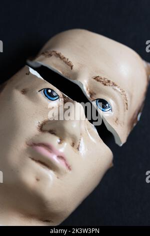 A split and broken face from a ceramic bust of a man Stock Photo - Alamy