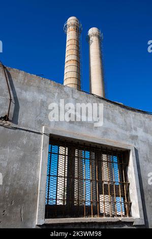 Twin chimneys remains of Cement Works demolished in Monopoli, Italy ...