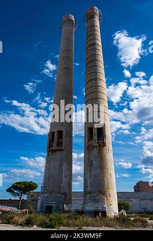 Twin chimneys remains of Cement Works demolished in Monopoli, Italy ...