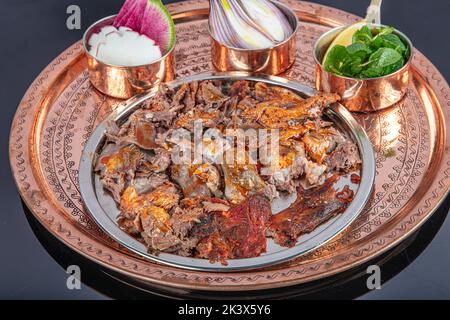 Turkey national cuisine dish Roasting lamb with meat. Roasted head of ...