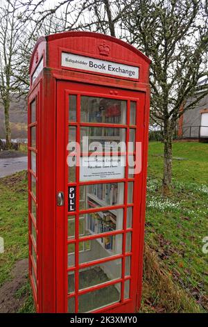 Repurposed book exchange telephone box Stock Photo - Alamy