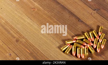 9 milimeter ammunition laying on the table Stock Photo - Alamy