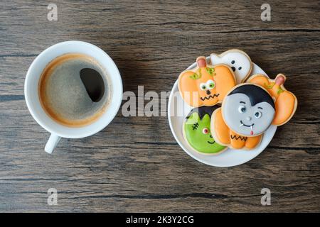 Happy Halloween day with funny Cookies set on wooden table background ...