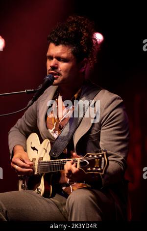 Australian singer songwriter and blues guitarist ash grunwald performs ...