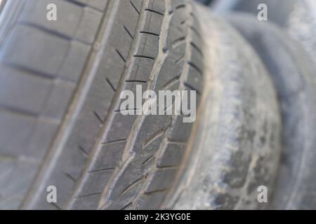Old damaged and worn black tire thread Stock Photo - Alamy