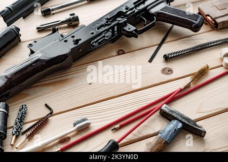 Gunsmith's working table for gun cleaning and maintaining Stock Photo ...