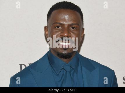 Warren S.L. Burke arrives at the DEAD FOR A DOLLAR Premiere held at the ...