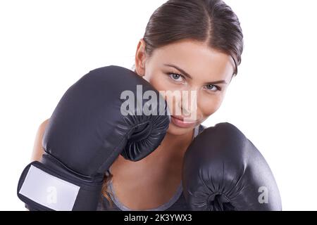 Shes ready for a fight. Portrait of an attractive young female boxer ...