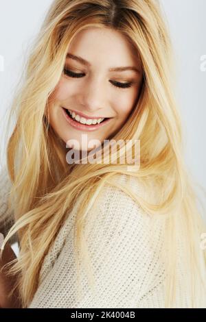 Closeup shot of a young caucasian female posing with a leaf Stock Photo ...