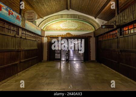 The colorful covered bridge in Lovech, Bulgaria at night. The bridge is ...