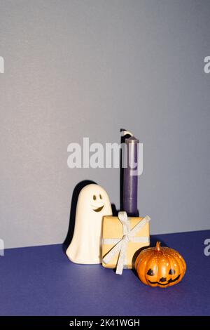 Orange gift box and pumpkin on white. Thanksgiving Day gift and freshly ...