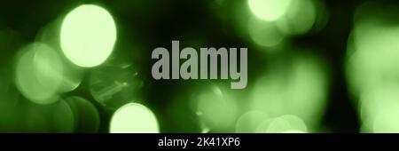 Blurred lights, green background, banner texture. Abstract bokeh with ...