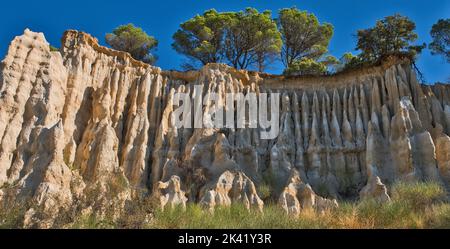 France, Pyrénées-Orientales. Steep sculpted sandstone cliffs and ...