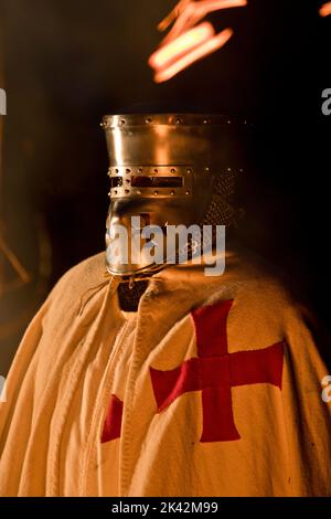 Templar Knight by fire, burning perhaps of fallen brothers in arms ...