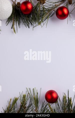 Image of christmas decorations with baubles and copy space on blue ...