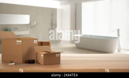 Wooden table, desk or shelf with stack of cardboard boxes over blurred ...