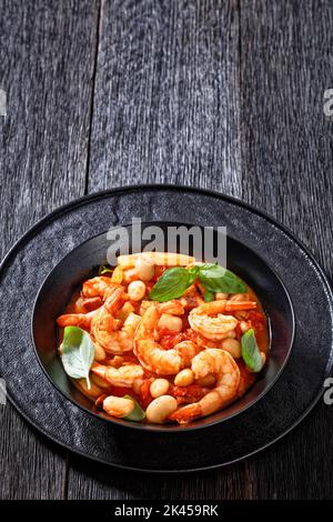 White Bean, Tomato, Fennel and Shrimp Dinner on white plate on white ...