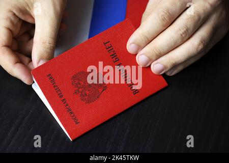 Translation: "military id". Soldier in ukrainian pixel uniform holding ...