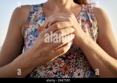 Woman tapping on the side of the hand - practicing EFT or emotional ...