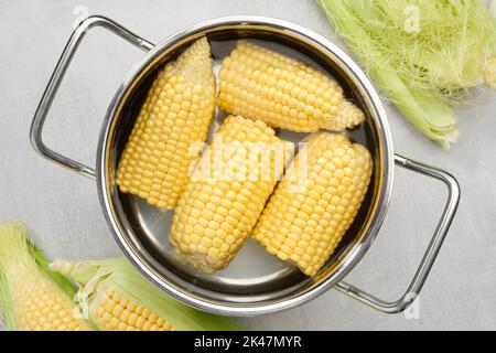 yellow popcorn and corncobs and raw corn, salt and sweet taste Stock ...