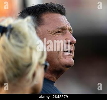 Former LSU football head coach Ed Orgeron, center, and his girlfriend Bailie Lauderdale, right ...