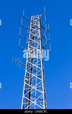 Pylon, the pylon under the blue sky white clouds Stock Photo - Alamy