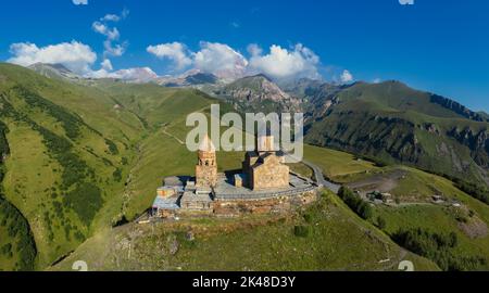 Aerial view to Gergeti Trinity Church or Tsminda Sameba, Holy Trinity ...