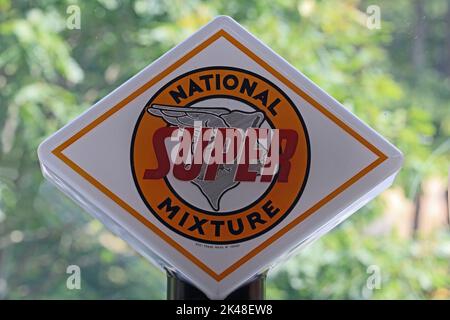 Illuminated, old, National Super petrol pump sign Stock Photo - Alamy