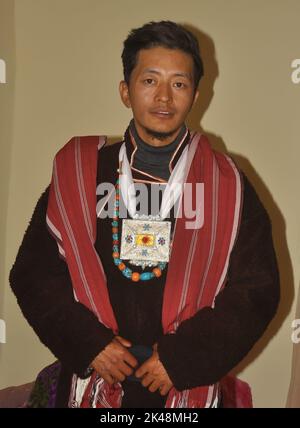 A Ladakhi man wearing Traditional Ladakhi Dress in Ladakh festivales ...