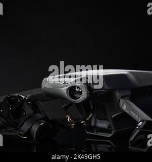 Drone DJI Mavic 3 after crashed on a black background. Drone after ...