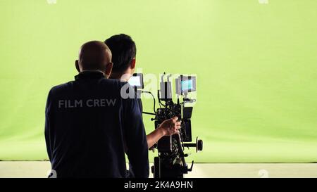 Photographer team and film crew and high definetion online video camera ...