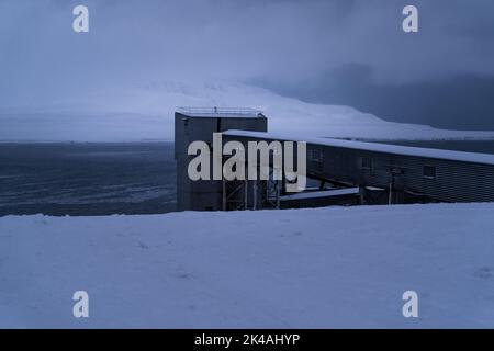 Coal elevator in Barentsburg on a cold, gloomy Winter day, Svalbard ...