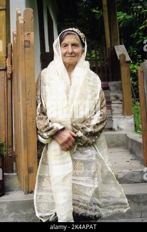 Nucsoara, Arges County, Romania, approx. 2000. Elderly woman wearing a ...