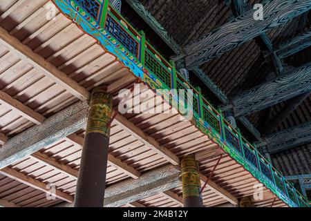 Colourful interior timber hall and structure of Chinese Dungan Uyghur ...