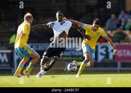 Reece Jamesof Sheffield Wednesday grabs hold on Ademipo Odubeko of Port ...