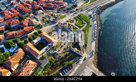 An aerial view of Nessebar cityscape surrounded by buildings and water ...